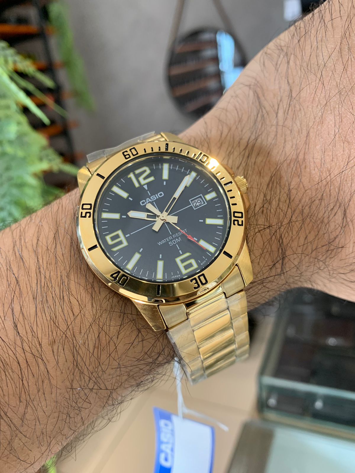Relógio Casio Masculino Dourado Visor Preto com Calendário e Taquímetro ...